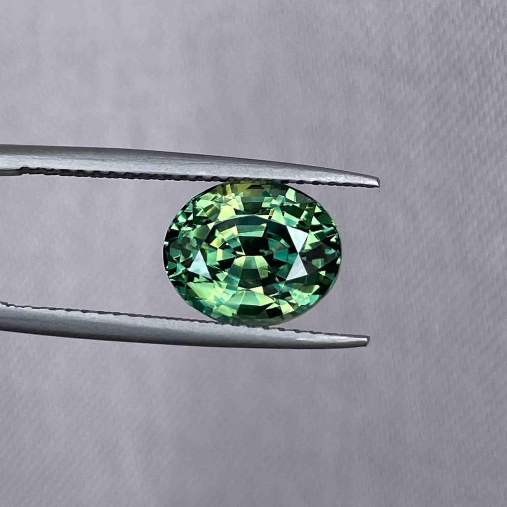 Teal Blue Green Parti Sapphire Oval Cut Gem - 4.27 Ct | NASHGEMS